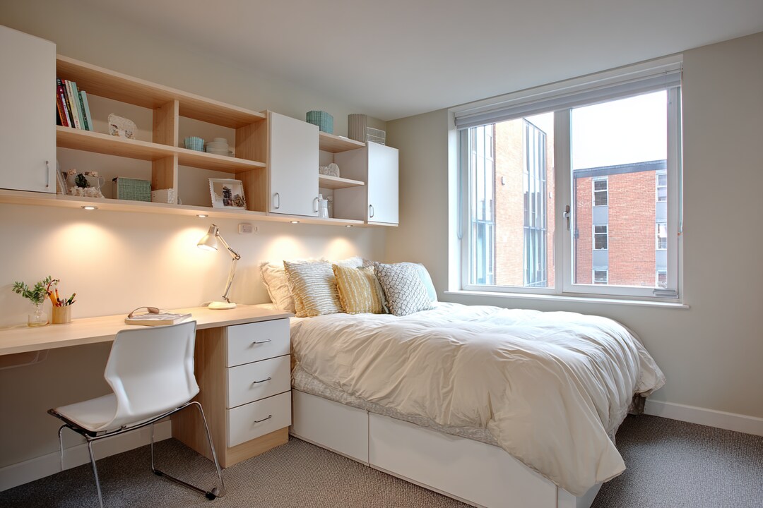 Modern Bedroom Design With A Double Bed And A Study Unit