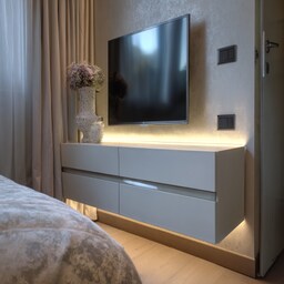 Modern White TV Unit Design With Shutter Storage